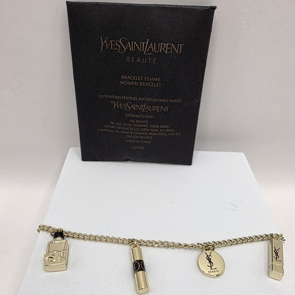 Yves Saint Laurent | Jewelry | Yves Saint Laurent Gold Charm Bracelet ...